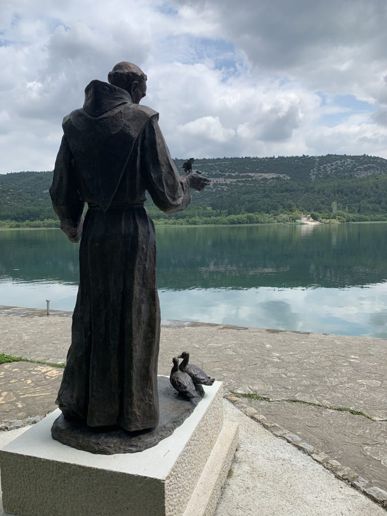 Monk statue at the river - Photos from Chris Hardie